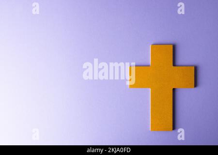 Composition of christian ash wednesday cross on purple background with ...