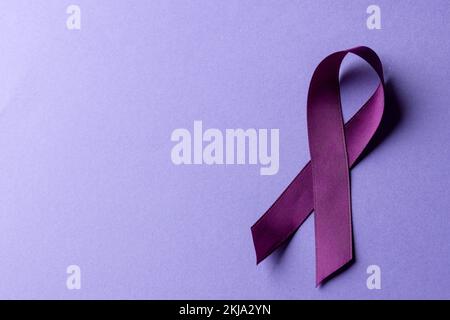 Composition of purple add or adhd awareness ribbon on purple background ...