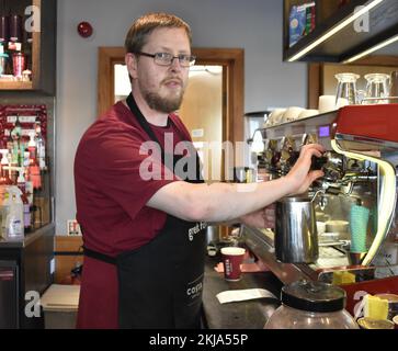 Indoor Portrait Of A Costa Coffee Worker Making Drinks For Customers ...