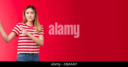 Whining displeased blond asian disappointed girl frowning hesitant ...