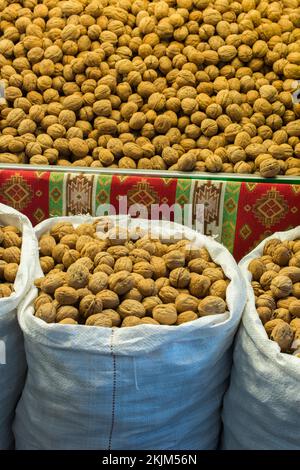 Sack of whole fresh walnuts with hard nutshells Stock Photo - Alamy