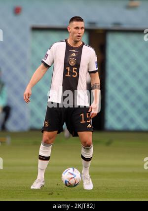 DOHA, QATAR - NOVEMBER 23: Niklas Sule of Germany controls the ball ...