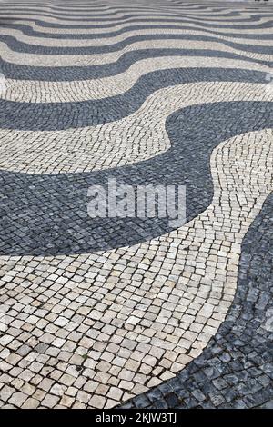 Traditional Portuguese cobblestone pattern in Lisbon Portugal Stock ...