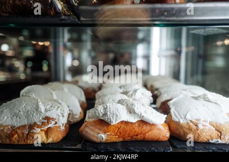 Delicious creamy typical pastry from Rome called Maritozzo Stock Photo ...