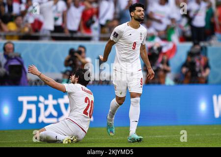 DOHA, QATAR - NOVEMBER 25: Sardar Azmoun, Ethan Ampadu during the FIFA ...