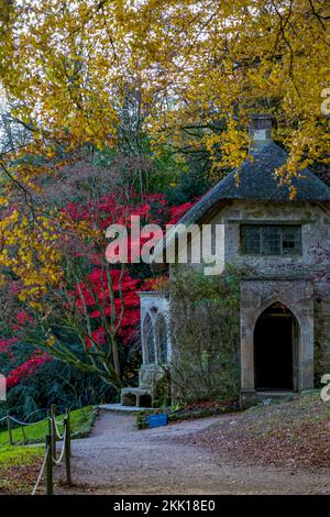 Spectacular autumn colour surrounds the thatched Gothic Cottage at ...