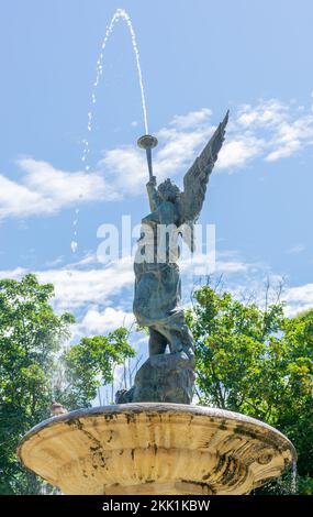 A vertical shot of an angel statue fountain in the park Stock Photo - Alamy