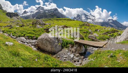 The Doldenhorn and Frundenhorn over the Oeschinensee lake Stock Photo ...
