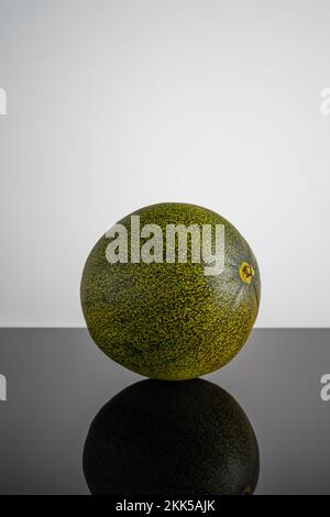 round melons on a light background, beautiful texture, autumn harvest ...