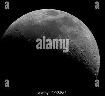 A scenic zoomed-in shot of the moon in the night sky Stock Photo - Alamy
