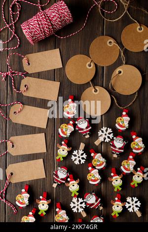 Clothespins with Santa Claus decoration and writable labels, on a ...