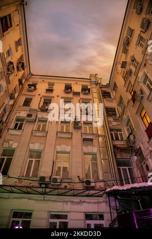 Old Moscow courtyard-well on a cold winter night Stock Photo - Alamy
