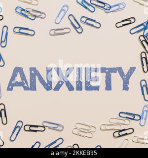Hand writing sign Anxiety. Internet Concept Excessive uneasiness and ...