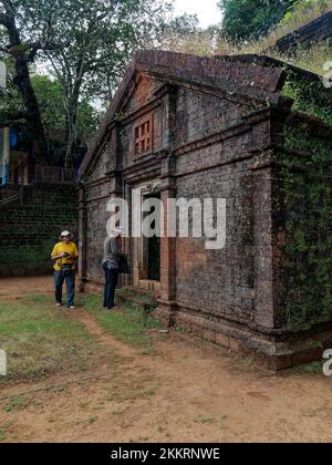 Tourist visiting Shri Saptakoteshwar Temple built using laterite stone ...
