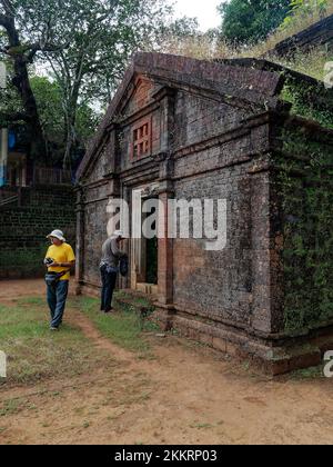 Tourist visiting Shri Saptakoteshwar Temple built using laterite stone ...