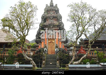 The recognizable architecture of Balinese temples. The entrance gate to ...