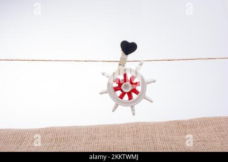 Steering wheel attached to a string Stock Photo - Alamy