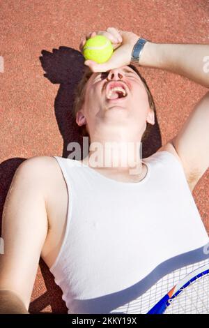 Tennis player crying on court Stock Photo - Alamy