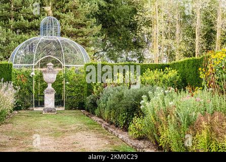 Wire pagoda at the end of one of the flower beds at Eythrope Gardens on ...
