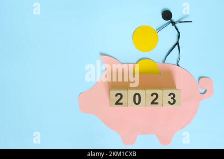 New year 2023 start saving resolution concept. Stick figure putting ...
