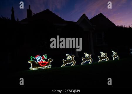 Adelaide, Australia. 26 November 2022. A Santa Claus on a sleigh and ...