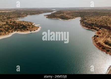 An aerial of lake El Embarcadero coast beside Pennarroya castle in ...