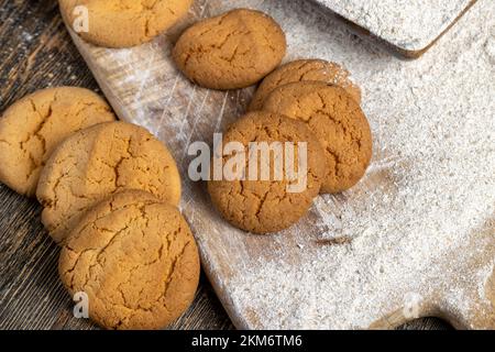 fresh wheat cookies made of white wheat flour on the table, several ...