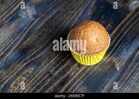 delicious wheat cupcakes on a black wooden table , fresh homemade ...