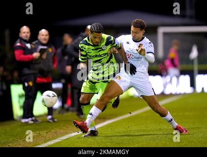 Forest Green Rovers' Myles Peart-Harris (second left) goes down after a ...