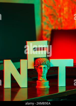 NFT (Non-Fungible token) and antique sculpture in neon light. Concept ...