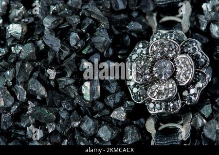 Photo of golden set with gems over dark background Stock Photo - Alamy