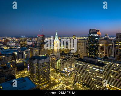 A drone shot of skyscrapers and a wide highway in Philadelphia in the ...