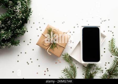 Digital phone mock up with rustic Christmas decorations for app ...