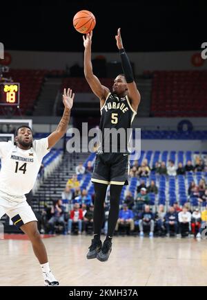 West Virginia guard Seth Wilson (14) is defended by Penn guard Lucas ...