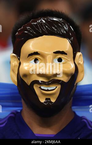An Argentina fan sports a Lionel Messi face mask ahead of the FIFA ...