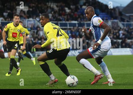Harrogate Town's Kayne Ramsay in action with Barrow's Kian Spence ...