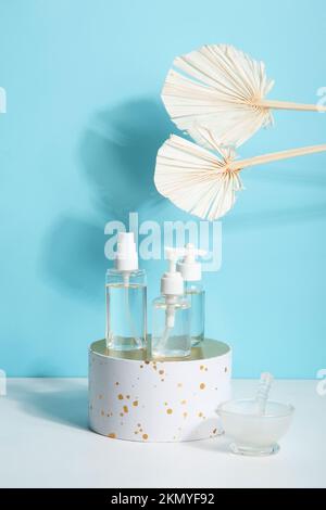 Podium for beauty product promotion, spring cotton twig on light blue ...