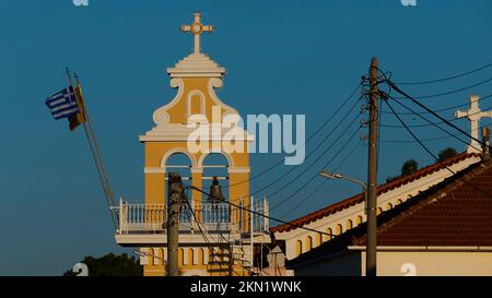 Panagia Church, orange steeple, Greek national flag, Orthodox flag ...