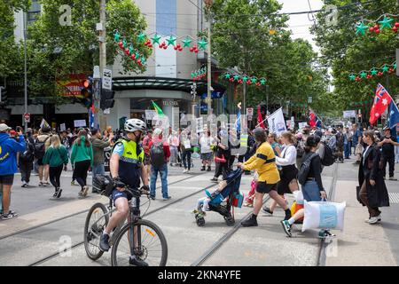 Melbourne police officer on a bicycle part of police operation ...