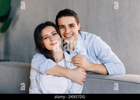 Loving husband comfort upset offended wife, caressing and hugging her ...