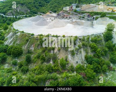 Mining with help of modern technology on slope of low mountain, in ...