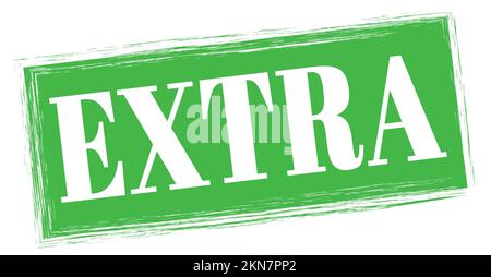EXTRA, text written on green grungy postal stamp Stock Photo - Alamy