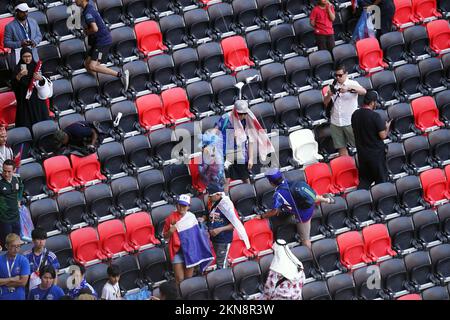Japan fans help clear up litter in the stands after the FIFA World Cup ...
