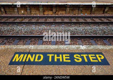Mind The Step Sign on a British Railway Station Platform Stock Photo ...