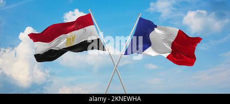 Egypt flag and France flag waving together on blue sky, two country ...