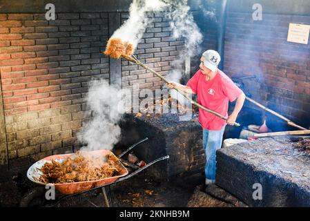 Manual agave distillation process for the production of tequila in ...