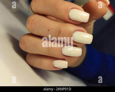 Amazing natural nails. Women's hands with clean manicure. Gel polish ...
