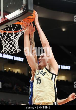 Purdue center Zach Edey (15) and forward Caleb Furst (3) go after a ...