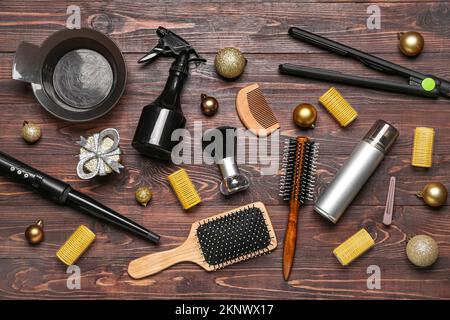 Hairdresser's tools with Christmas balls on pink background Stock Photo ...