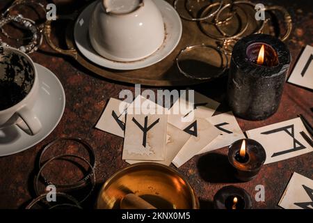 Magic attributes of fortune teller on green table Stock Photo - Alamy